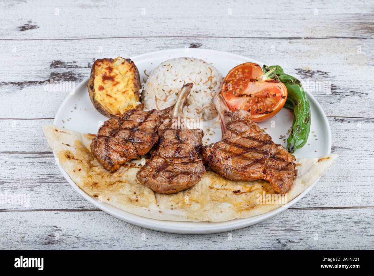 Grilled lamb chops in delicious view, Turkish name kuzu pirzola ...
