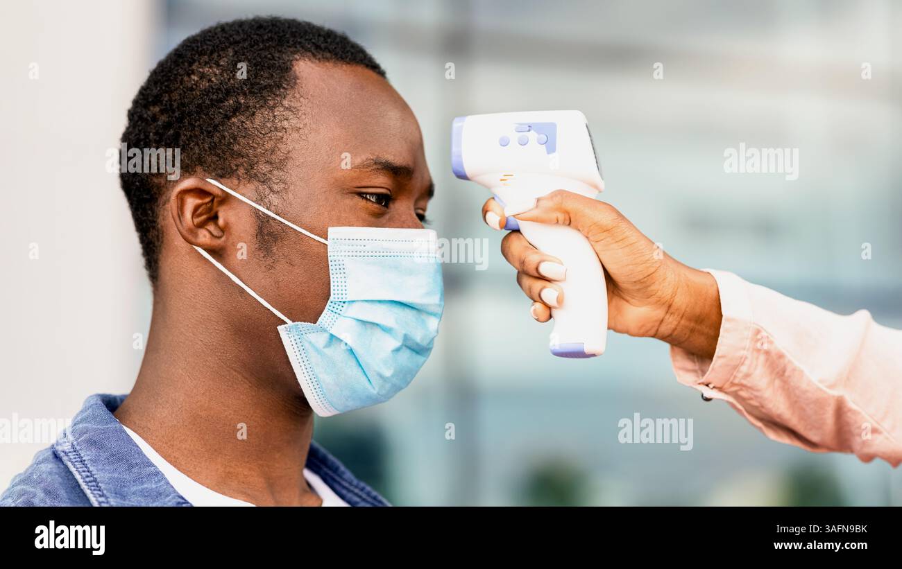 Security Checking Body Temperature With Electronic Thermomether For ...