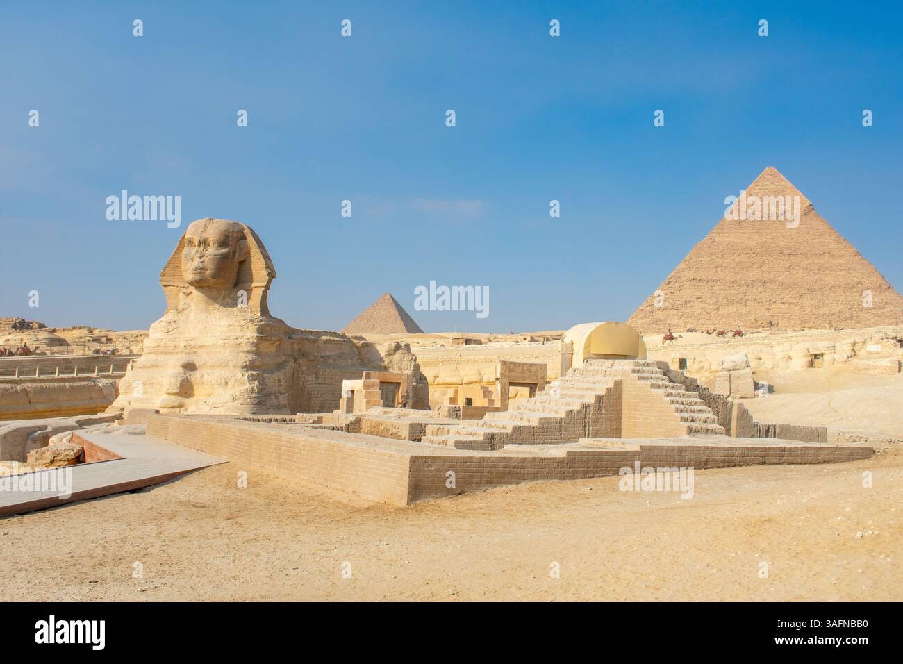 Great Sphinx and Great Pyramid of Cheops, Cairo, Egypt. Ancient statue ...