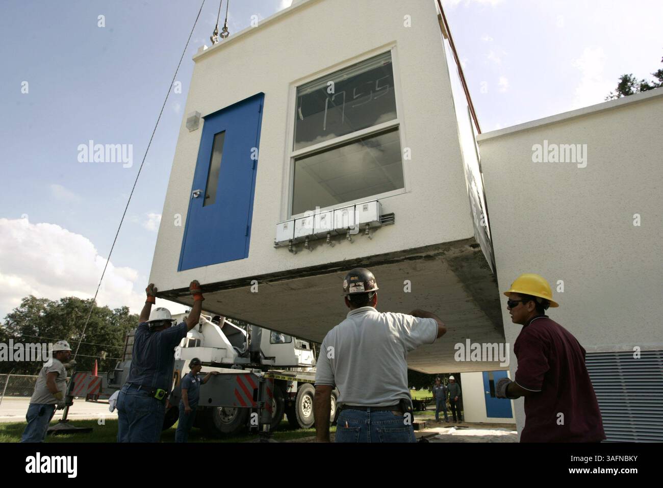 CAPTION: (10/14/2005, BROOKSVILLE) Workers with Royal Concrete Concepts ...