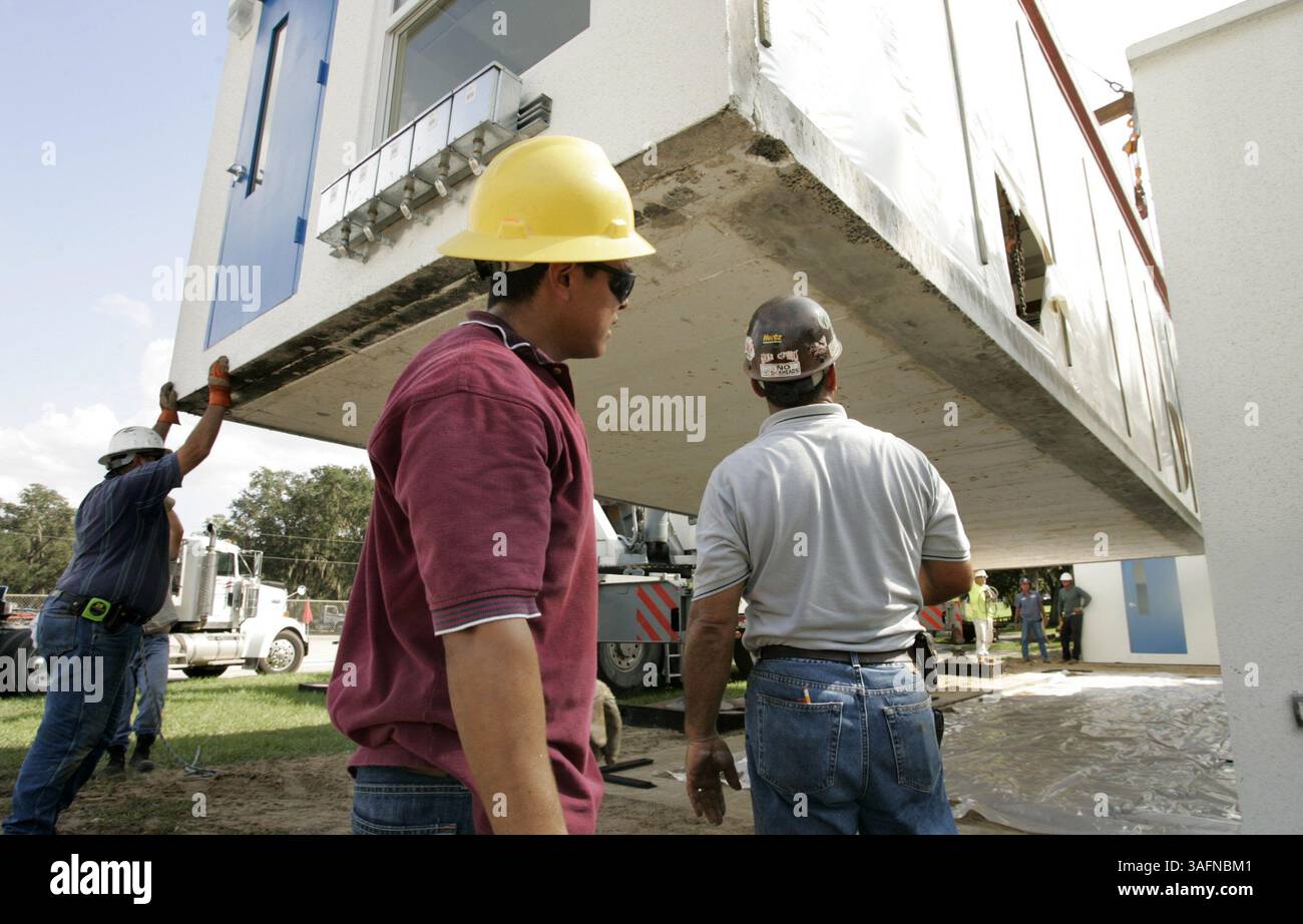 CAPTION: (10/14/2005, BROOKSVILLE) Workers with Royal Concrete Concepts ...