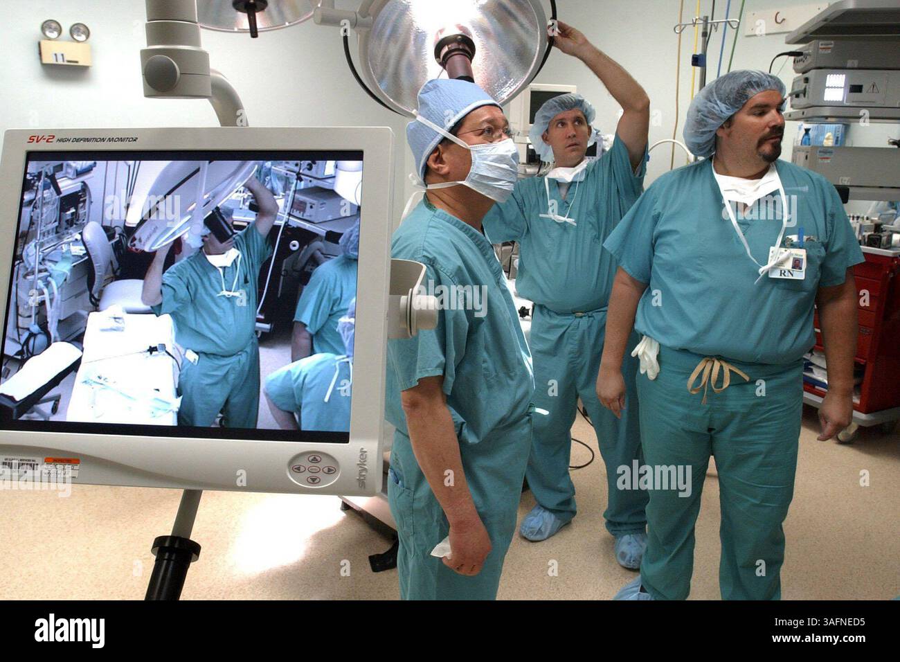 CAPTION: [04/19/2005 - New Port Richey].Surgical technician Butch ...