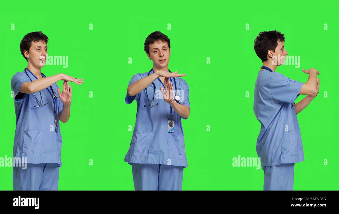 Medical assistant giving timeout symbol against greenscreen backdrop ...