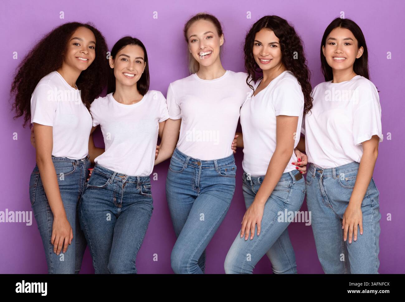 Five Joyful Diverse Ladies Posing Embracing And Smiling, Purple ...