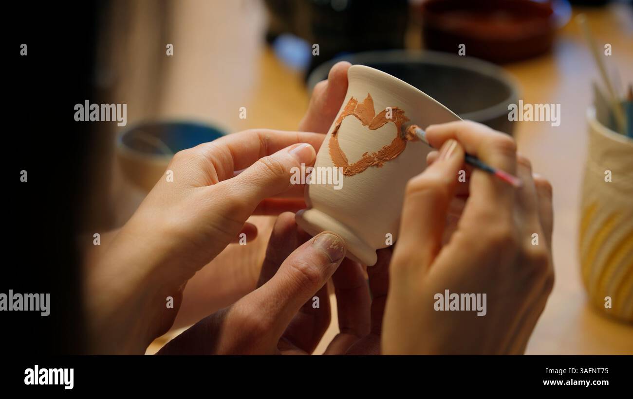 Human hands couple family woman man girl guy together painting clay art ...