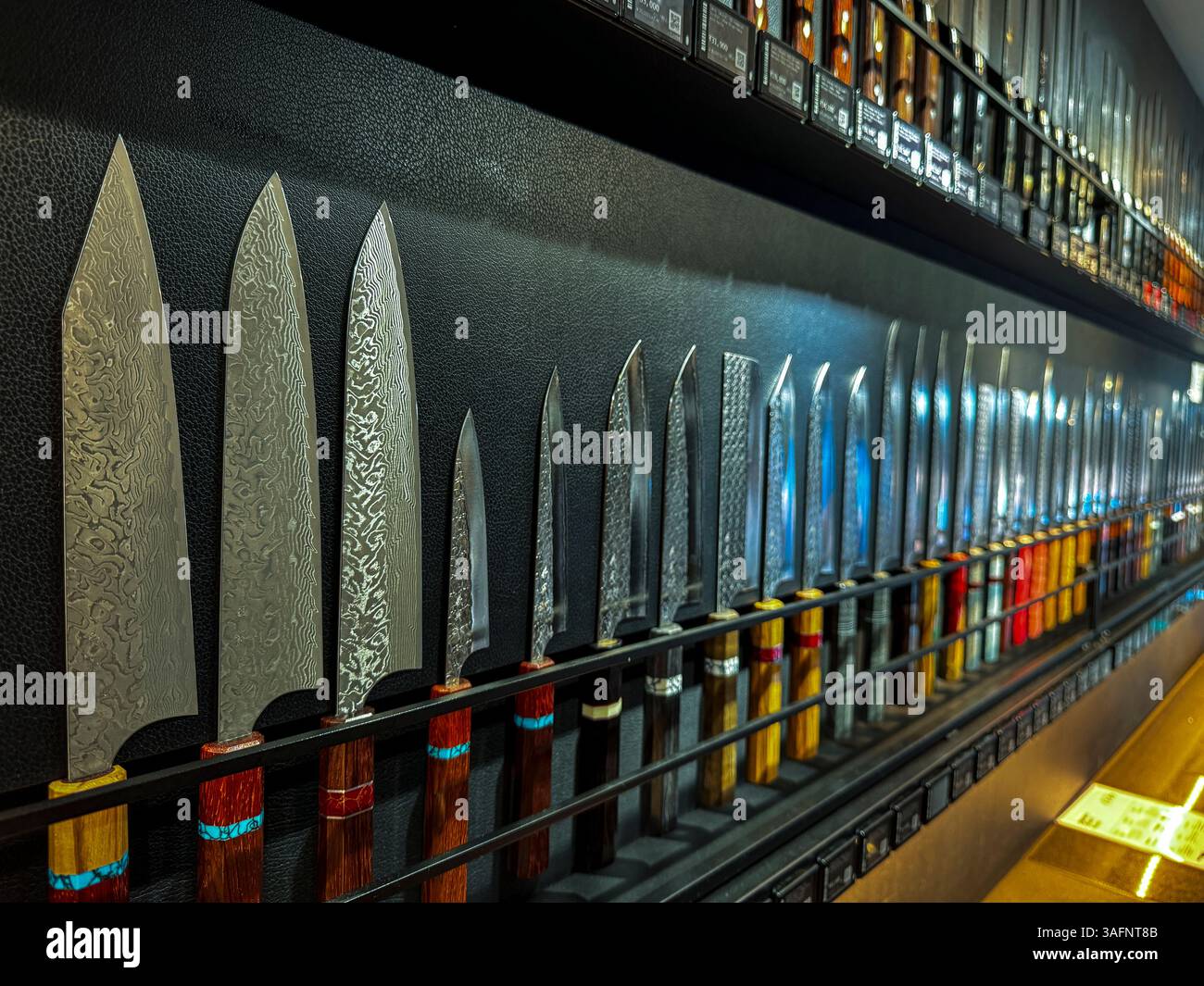 Display of Japanese knives in a shop in Tsukiji market in Tokyo, Japan ...
