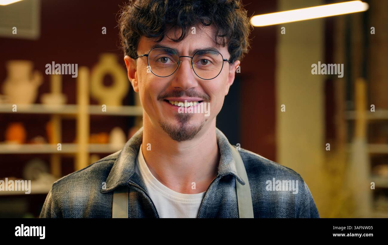 Portrait happy smiling Caucasian guy potter man small business owner ...