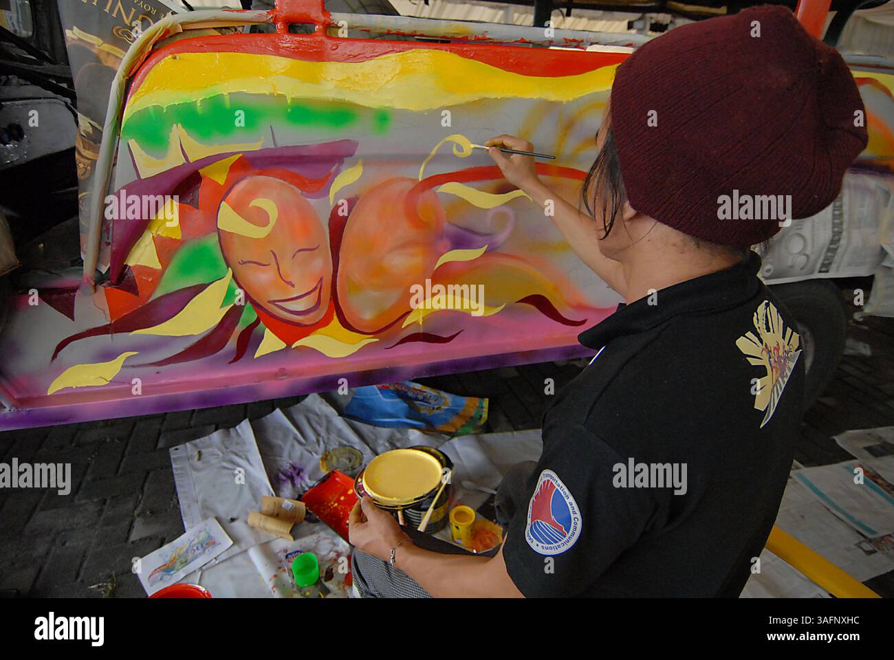 Sept. 20, 2012 - Manila, Philippines - An artist paints a jeepney as ...