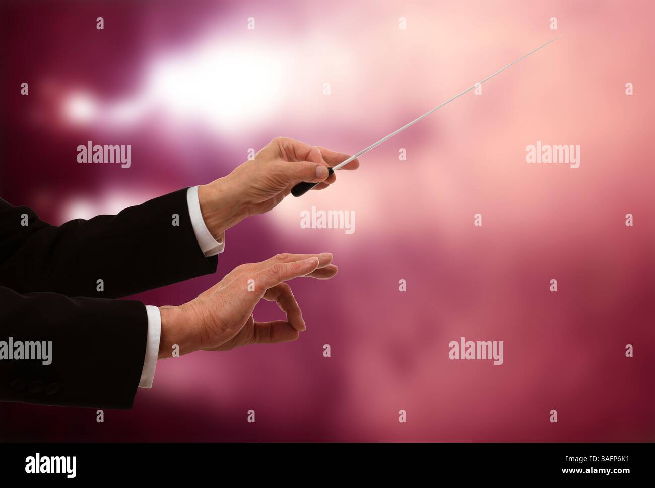 Conductor with baton in concert hall, closeup. Space for text Stock ...