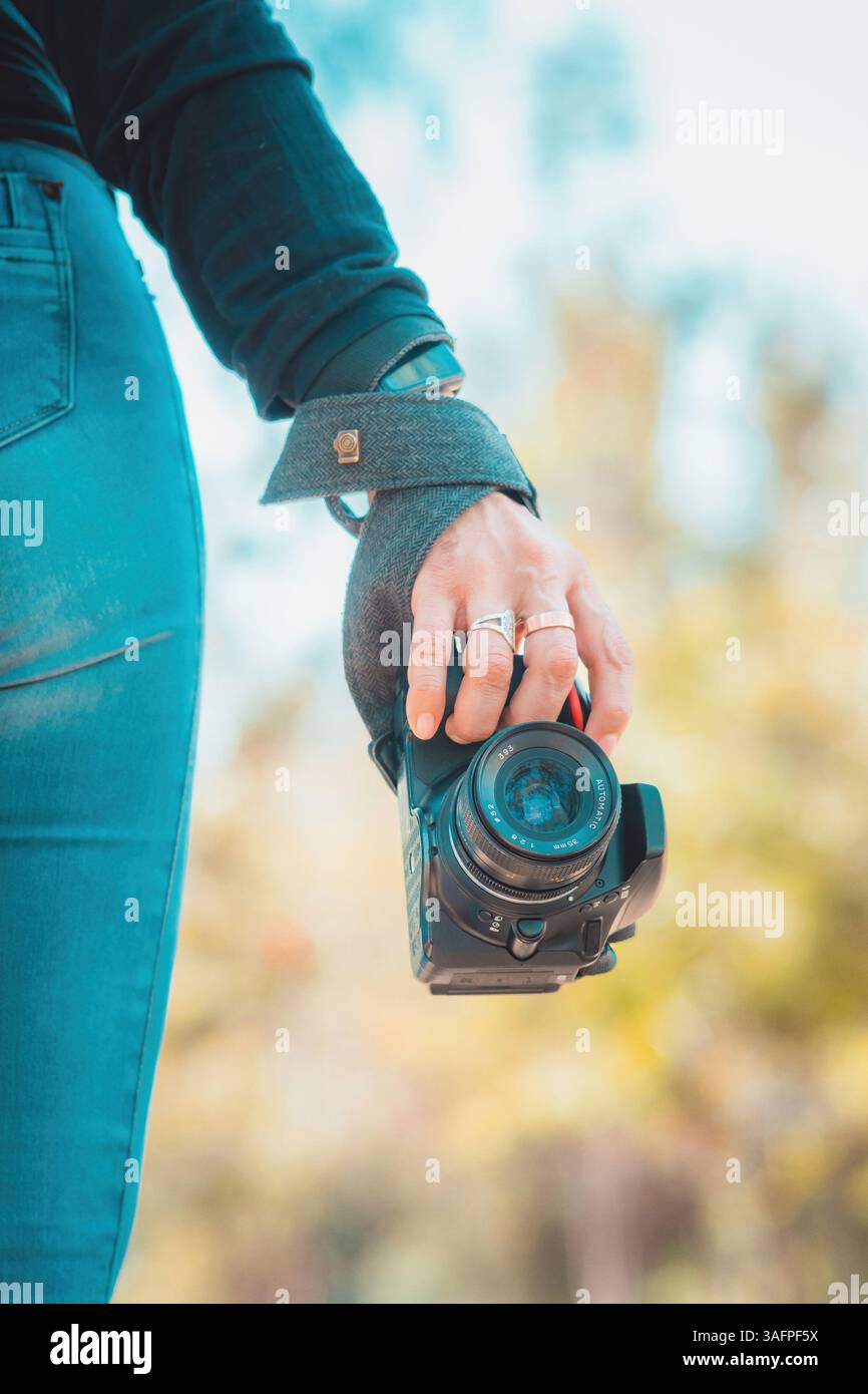 Photographer holds retro camera, has space to write, photographer's day ...