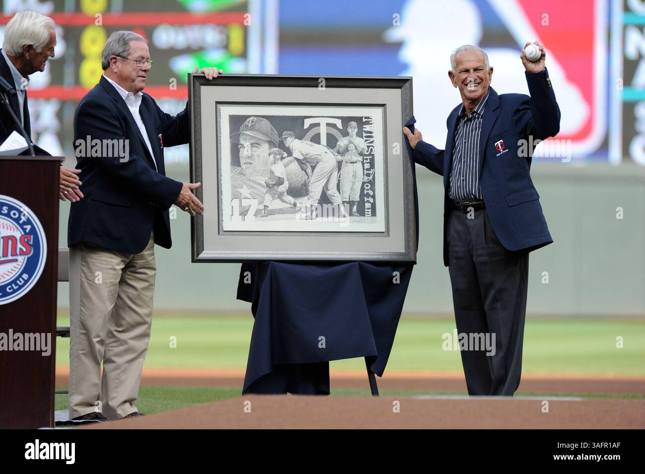 2012 JUL 14: Former Twins great Camilo Pascual (right) celebrates his ...