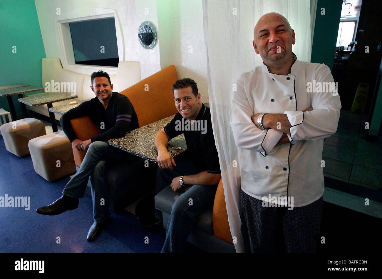 CAPTION: 10/28/2005; (right to left) Luis Flores (cq), Jeff Gigante (cq ...