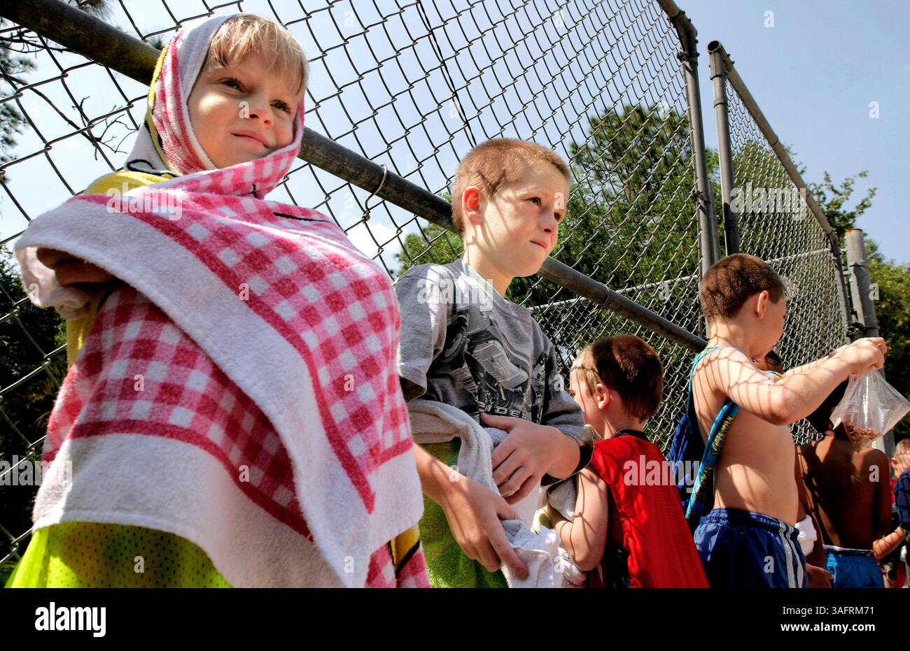CAPTION: (06/05/2006, INVERNESS) 7-year-old Jasmine Blaylock (cq) wraps ...