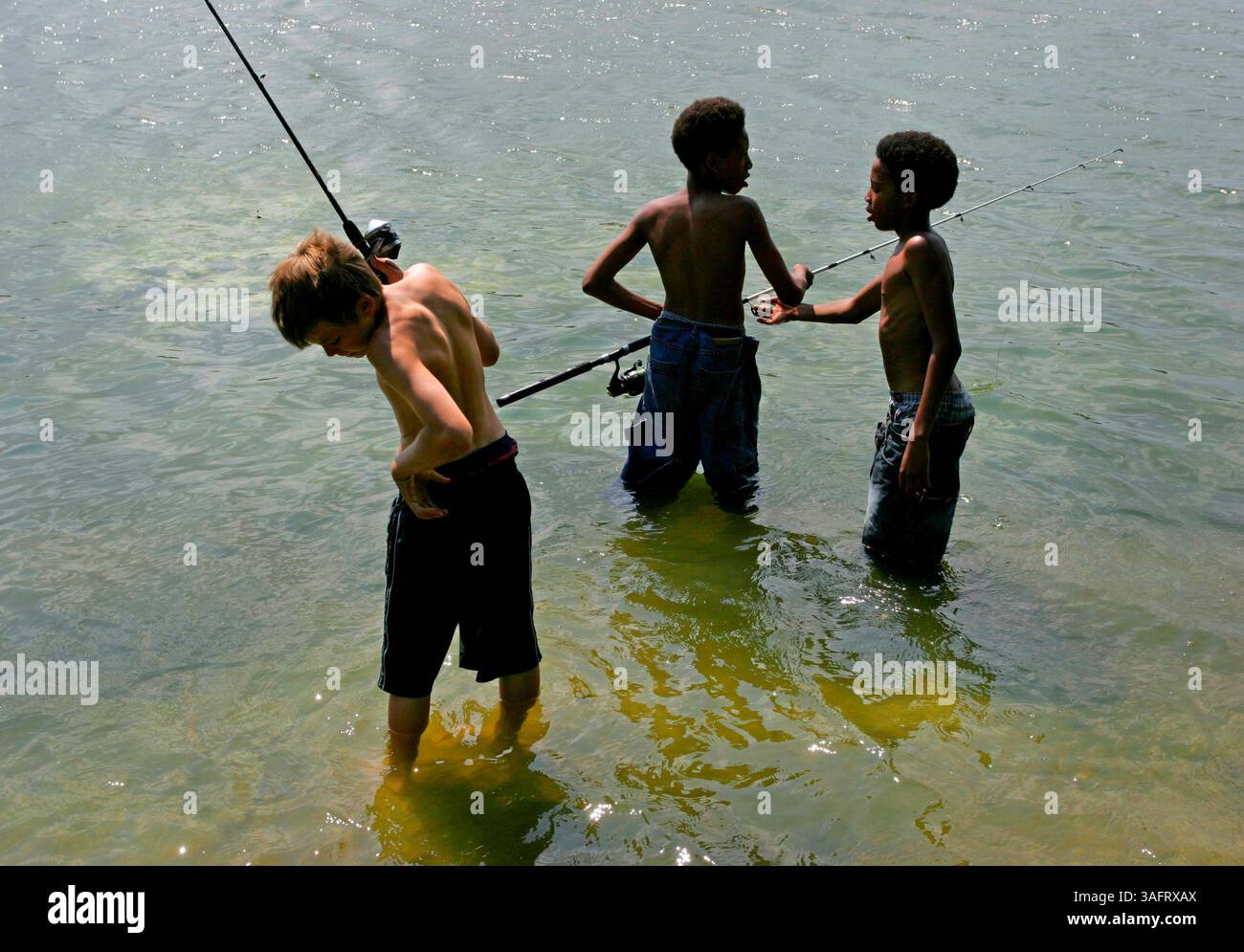 CAPTION: (St. Petersburg, 5/27/2006) (From left) Dale Moody (cq), 13 ...