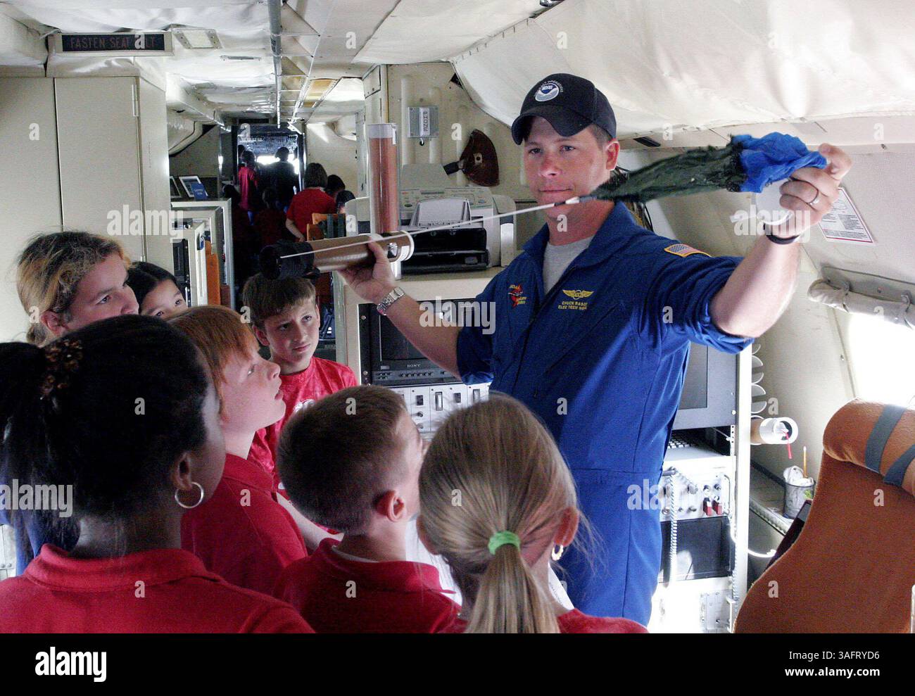 Caption: (Tampa, Fl; 05/05/2006) NOAA Technician Chuck Rasco (cq) shows ...