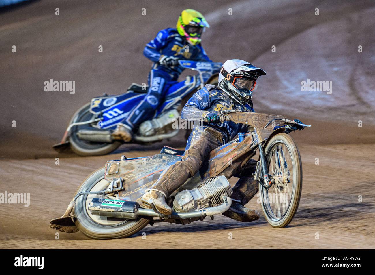 Ben Cook of Kings Lynn Stars in White leading team mate Richard Lawson ...