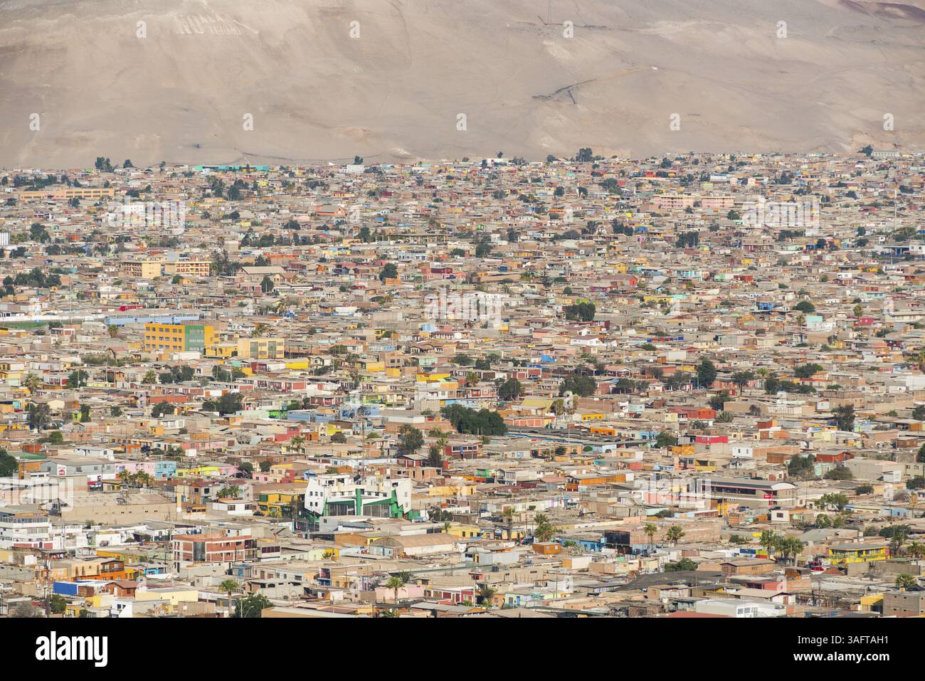 View from the Morro de Arica lookout mountain of the small colourful ...