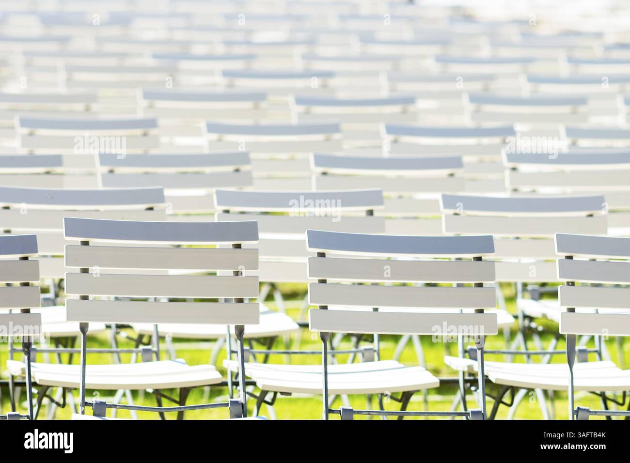 White open back chairs hi-res stock photography and images - Alamy