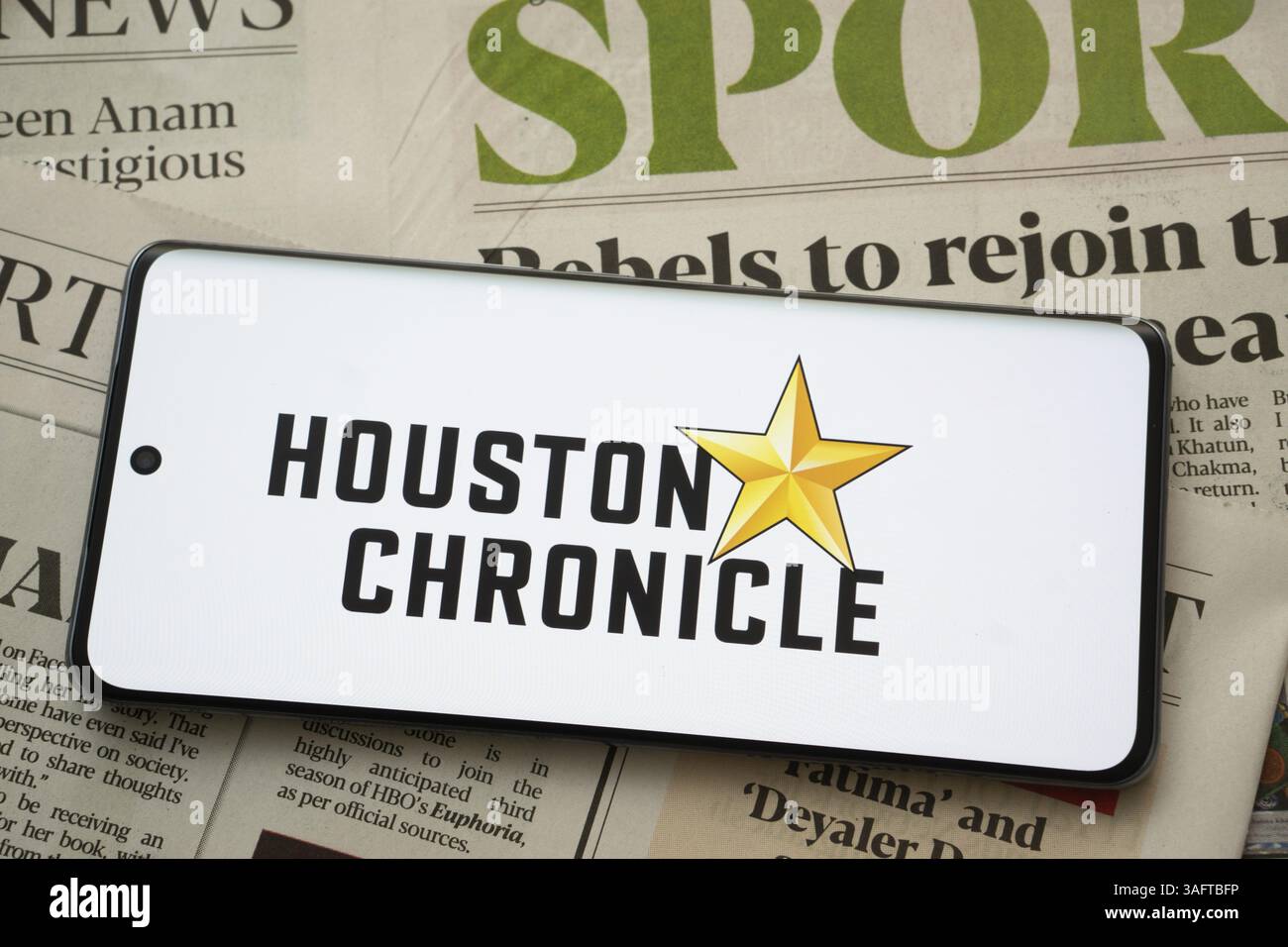The logo of the newspaper houston chronicle is displayed on a ...