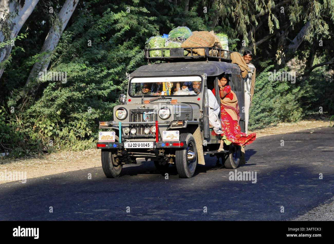 Ranakpur Temple, Ranakpur, Rajasthan, Loaded vehicle with people ...
