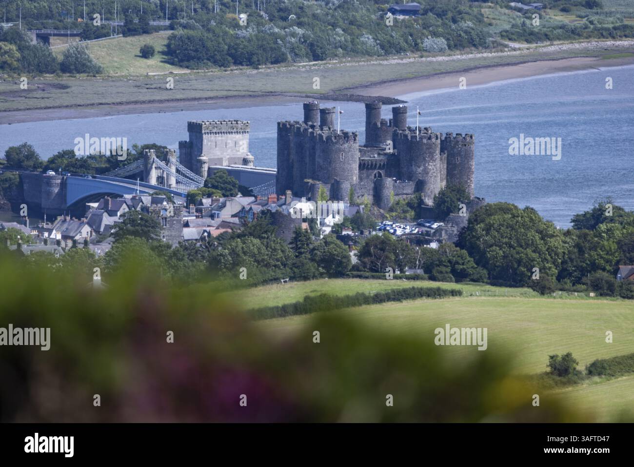 View from the mountains to Conwy Castle, ruins of the medieval castle ...