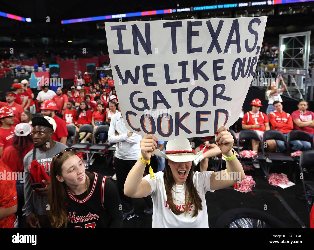 San Antonio, United States. 07th Apr, 2025. A Houston Cougars fan holds ...