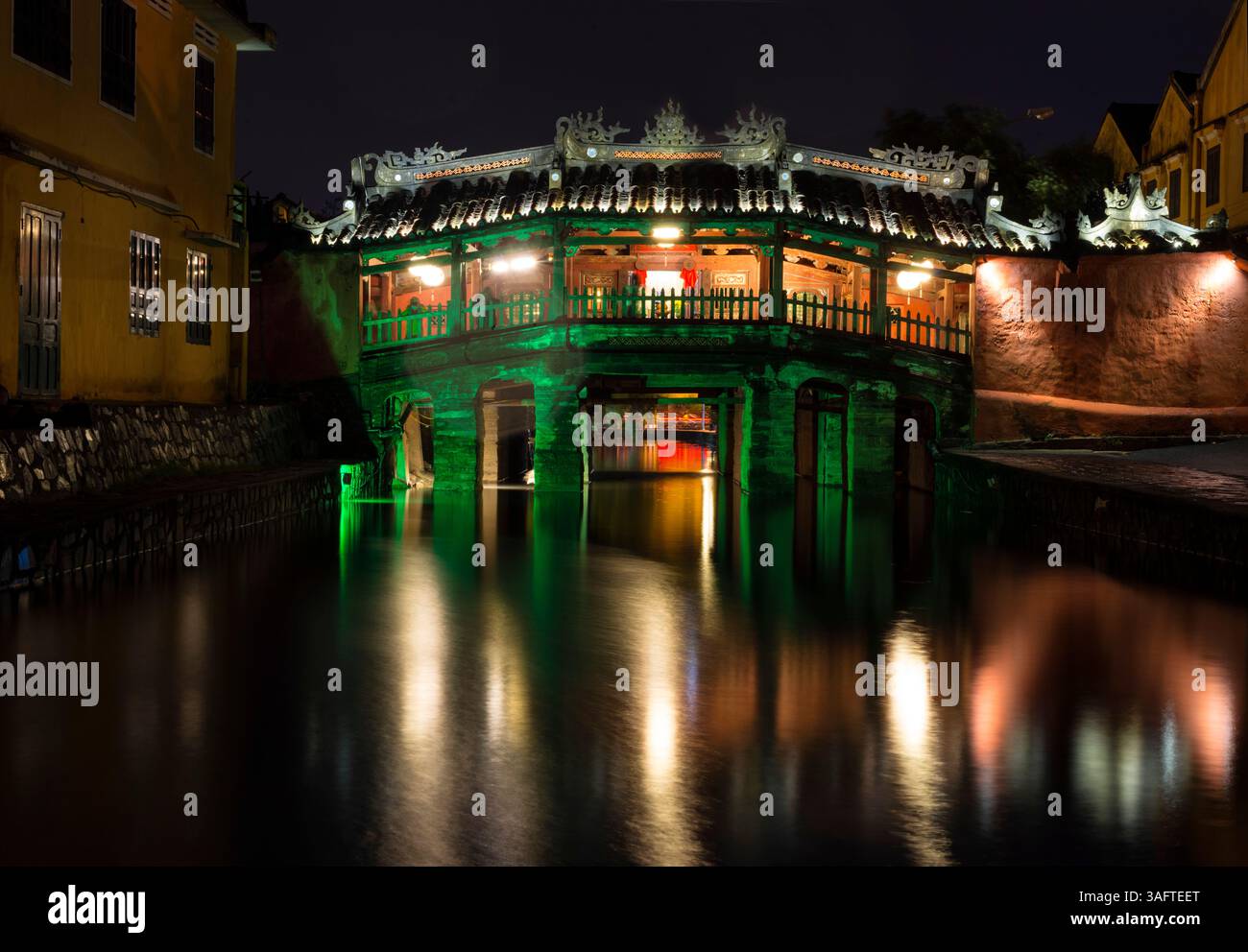 Photo shows the Japanese Bridge lit up at night in HOI AN, Vietnam on ...