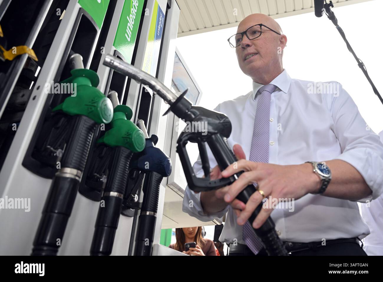 Leader of the Opposition Peter Dutton at a petrol station in Hoxton ...