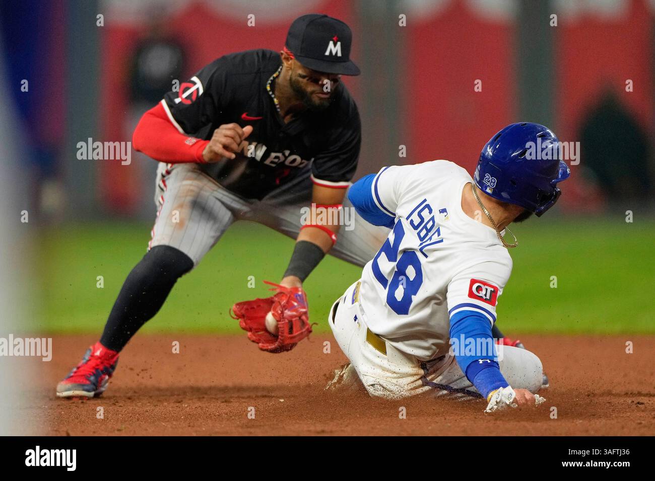 Kansas City Royals' Kyle Isbel (28) is caught stealing second by ...