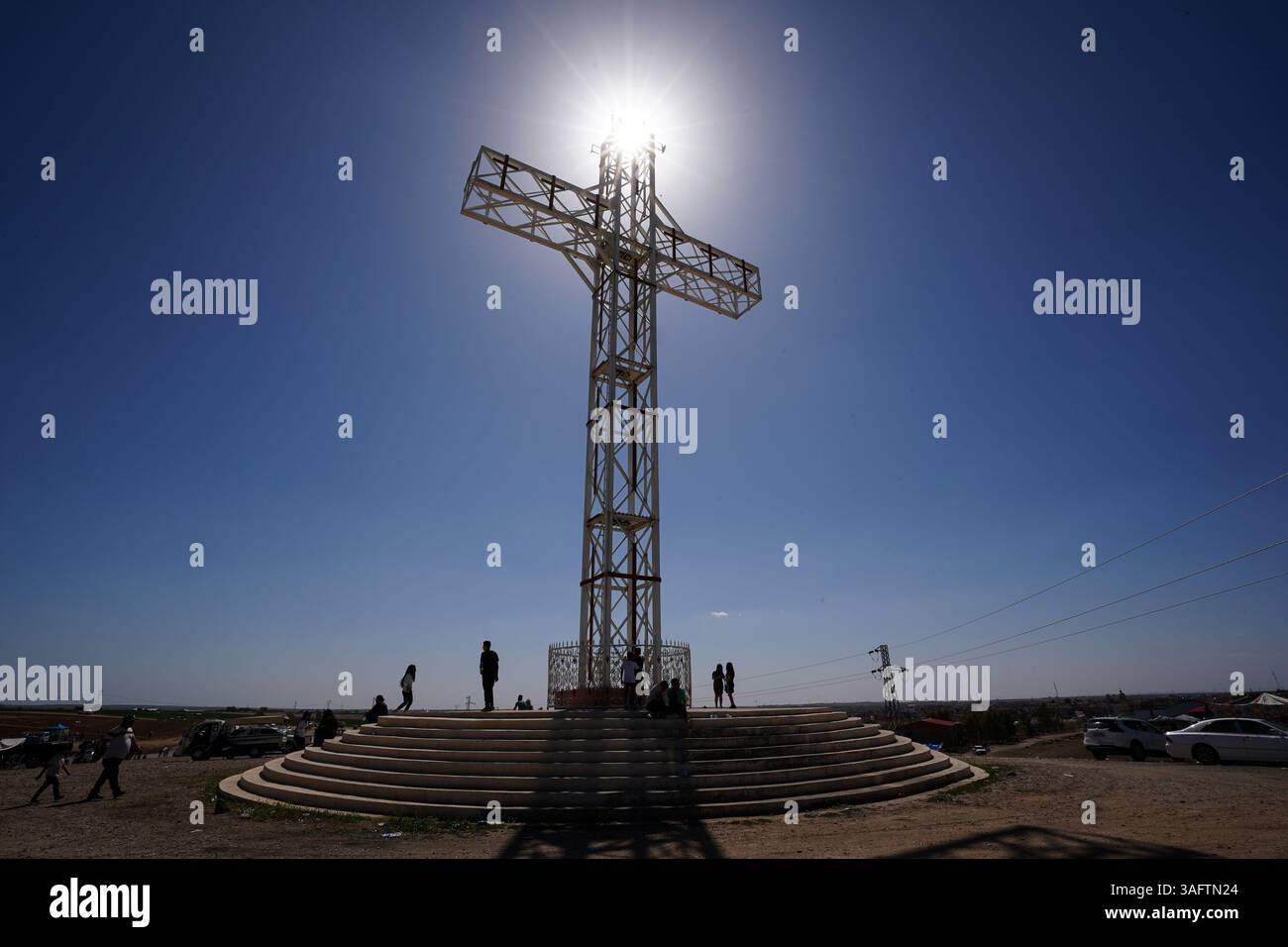 Qaraqosh, Iraq. 06th Apr, 2025. A view of the cross on the ruins of ...