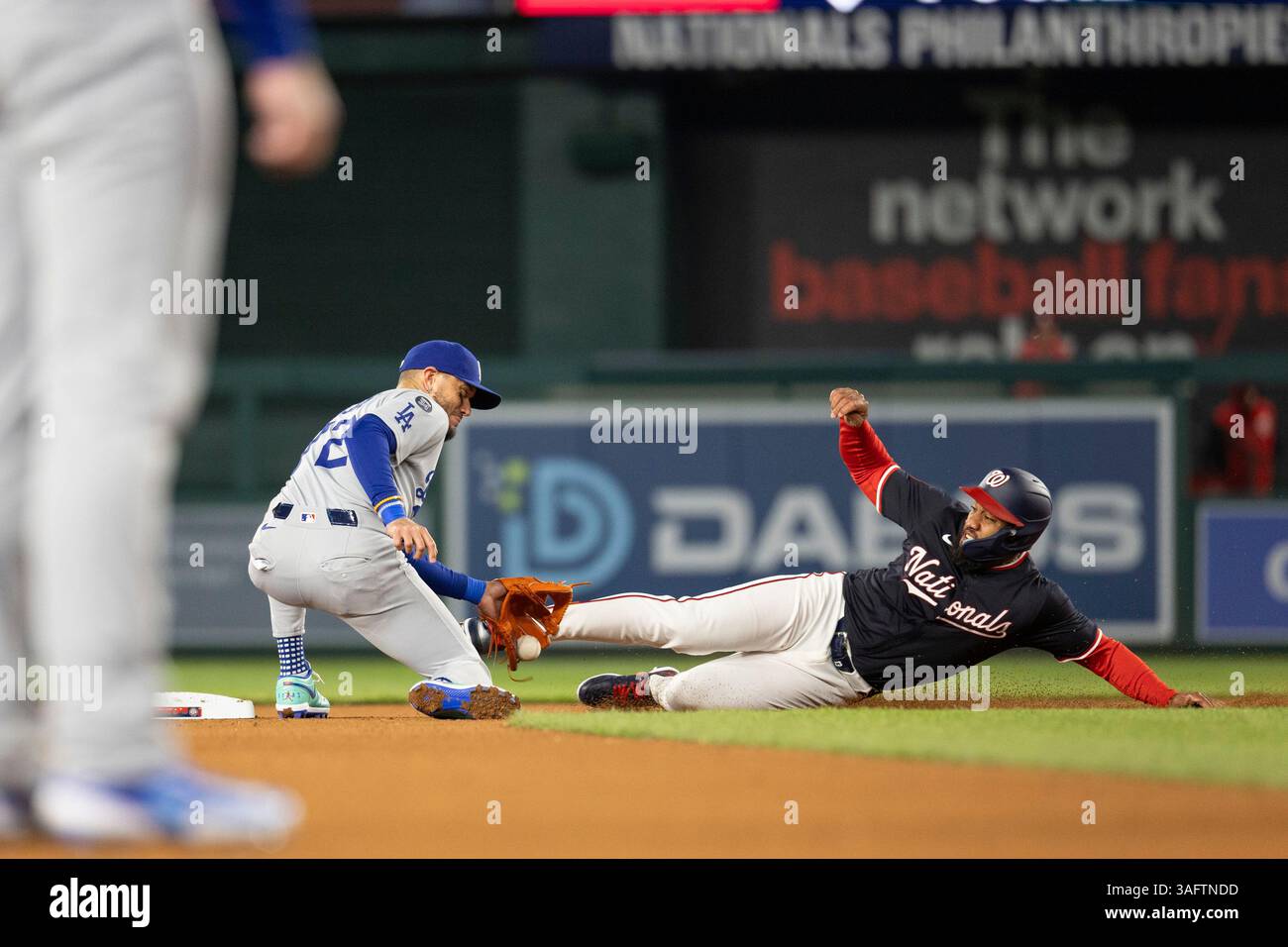 WASHINGTON, DC - APRIL 07: Washington Nationals shortstop Paul DeJong (14) slides into second ...