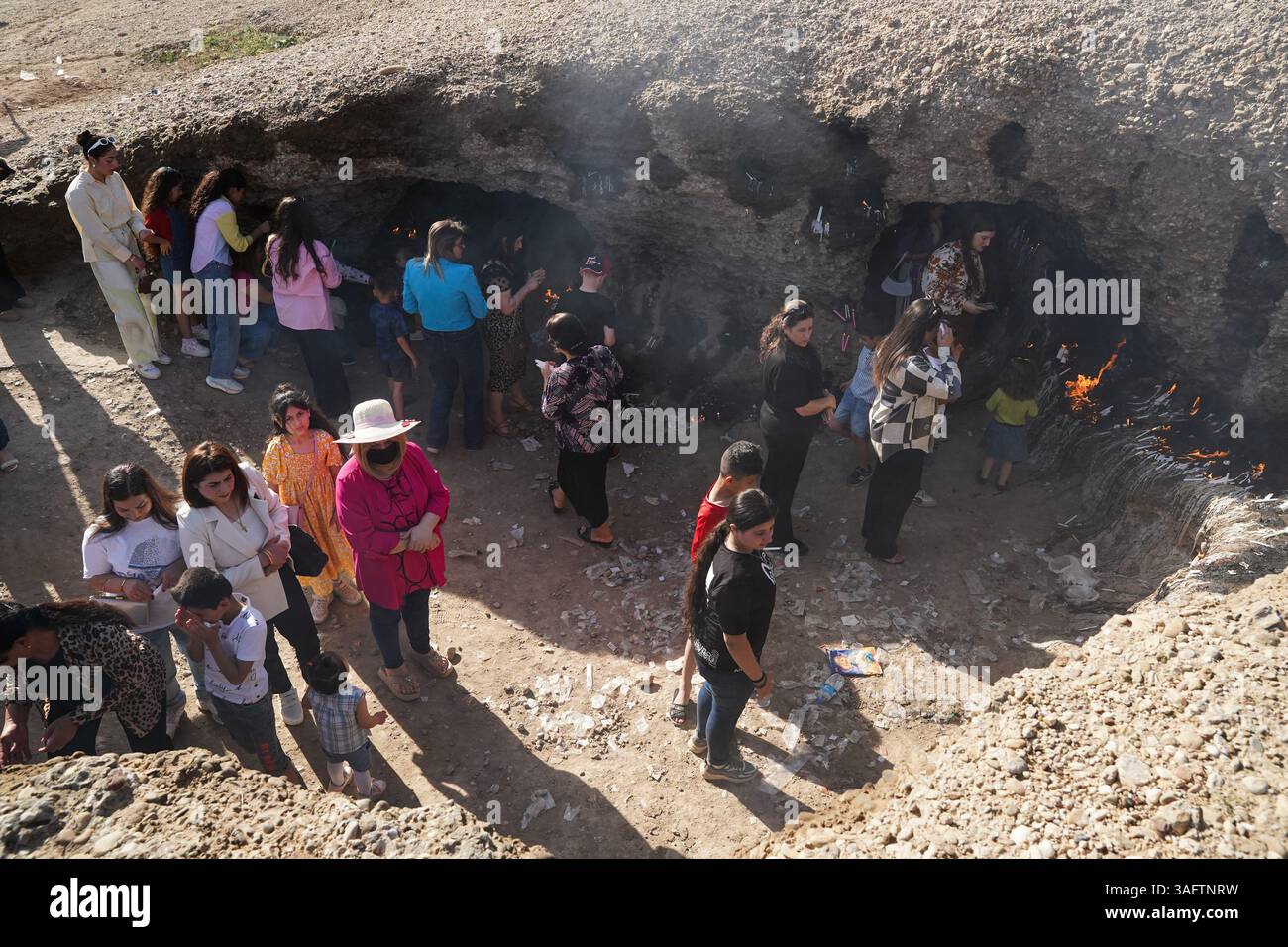 Qaraqosh, Iraq. 06th Apr, 2025. Iraqi Christians seen on the ruins of ...