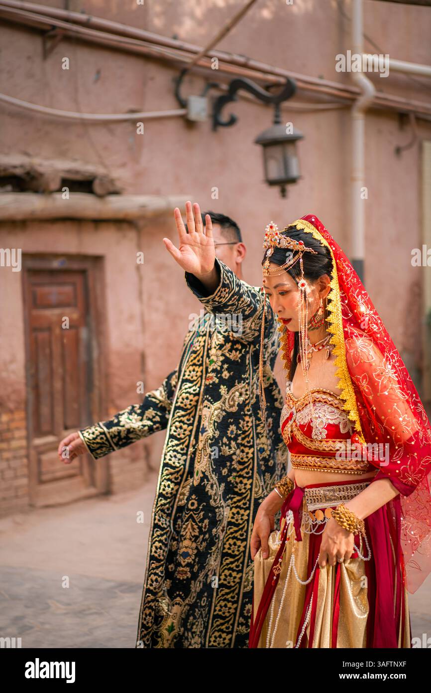 Kashgar, Xinjiang, China - JULY, 17, 2023: A couple wearing Uighur ...