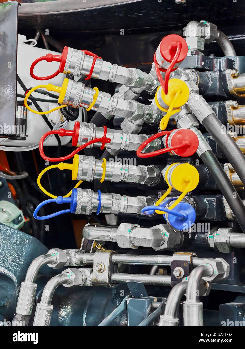 Exploring the intricate details of hydraulic connectors and hoses in a ...