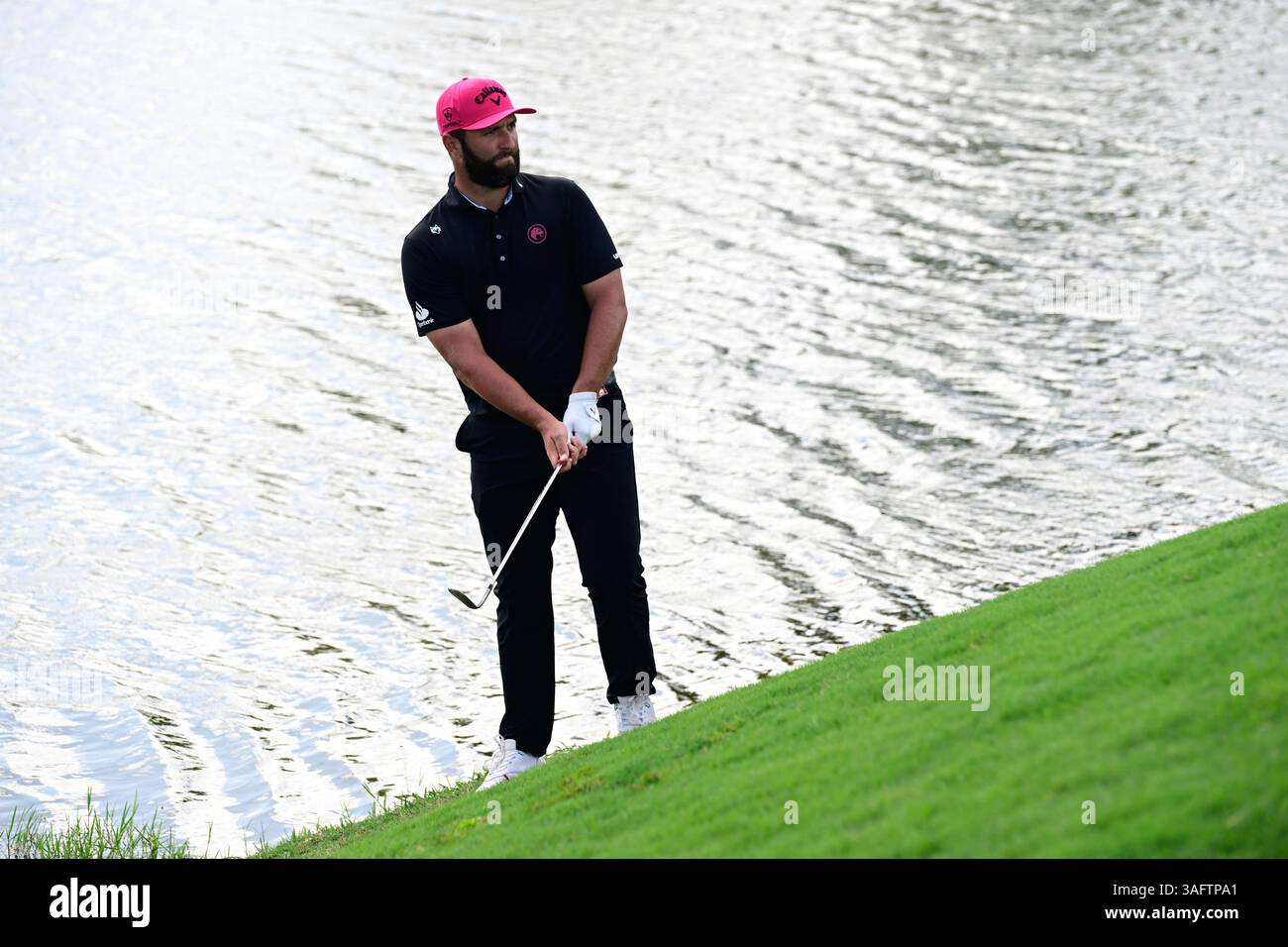 DORAL, FL - APRIL 06: Jon Rahm, chips from the ruff on the 18th hole ...