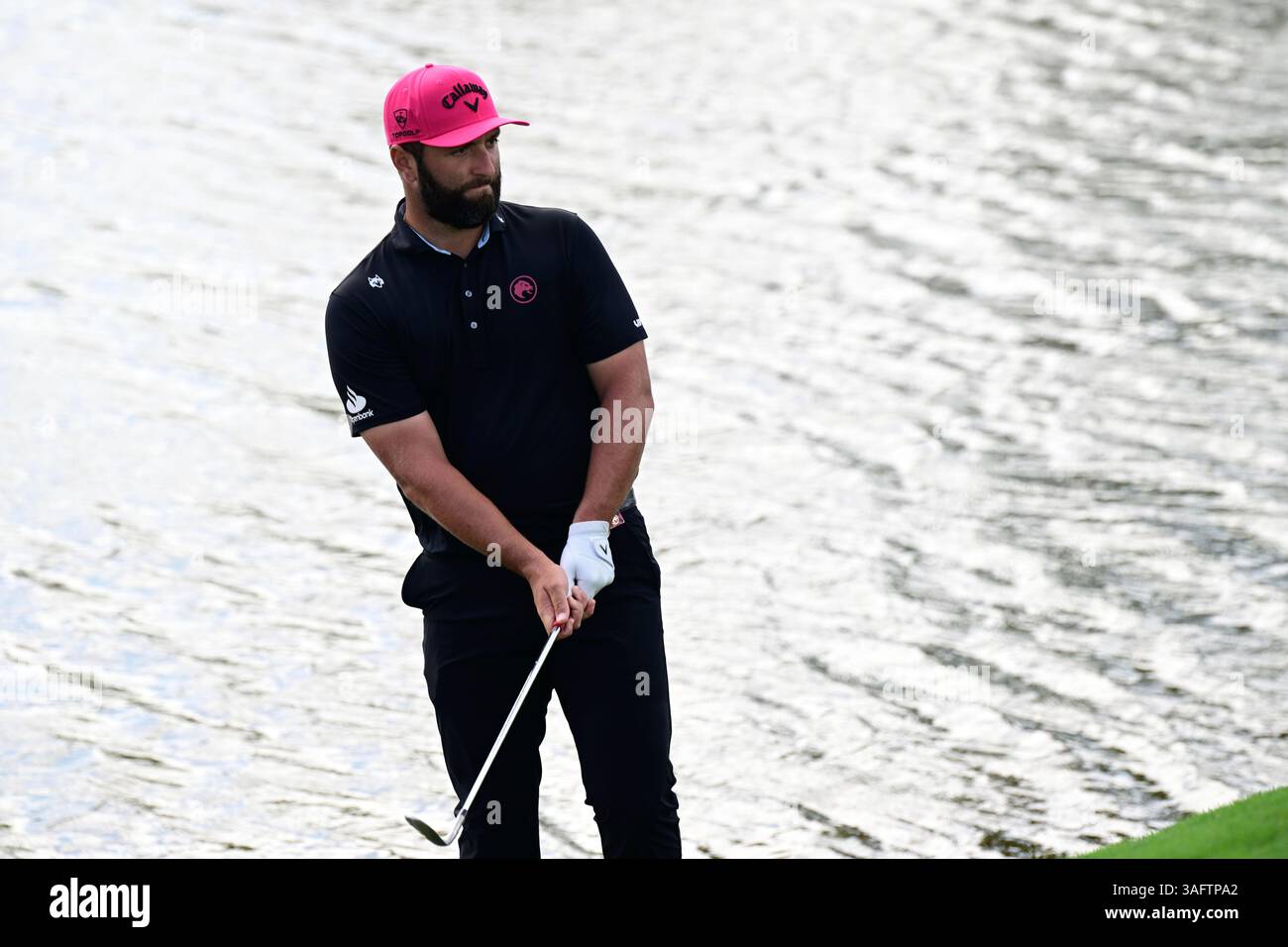 DORAL, FL - APRIL 06: Jon Rahm, chips from the ruff on the 18th hole ...
