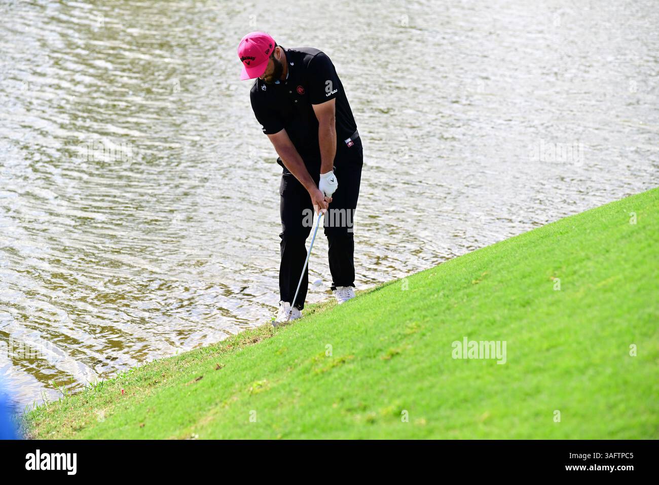DORAL, FL - APRIL 06: Jon Rahm, chips the ball on the 18th hole, during ...