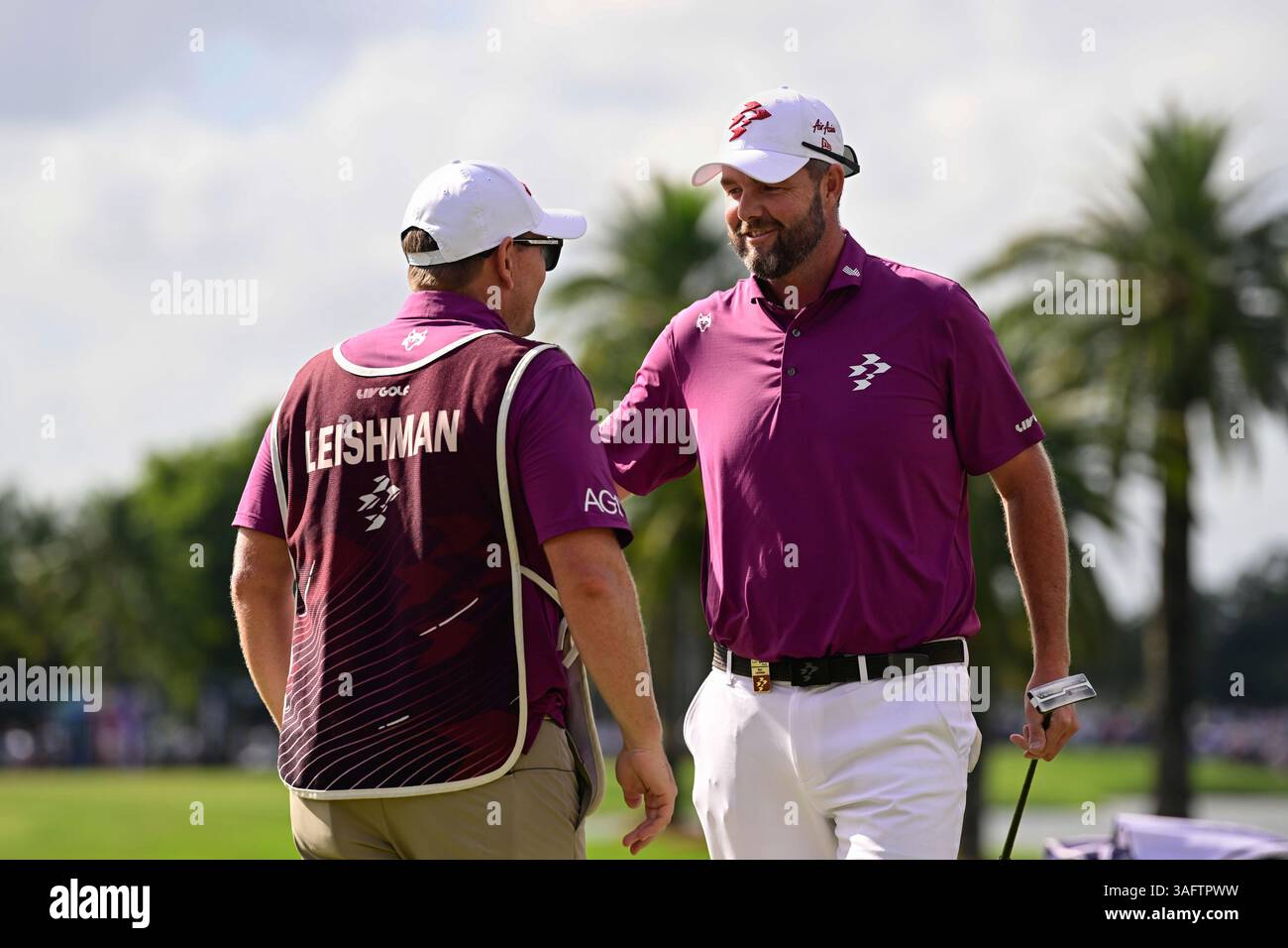 DORAL, FL - APRIL 06: Marc Leishman and caddie Matt Kelly celebrate ...