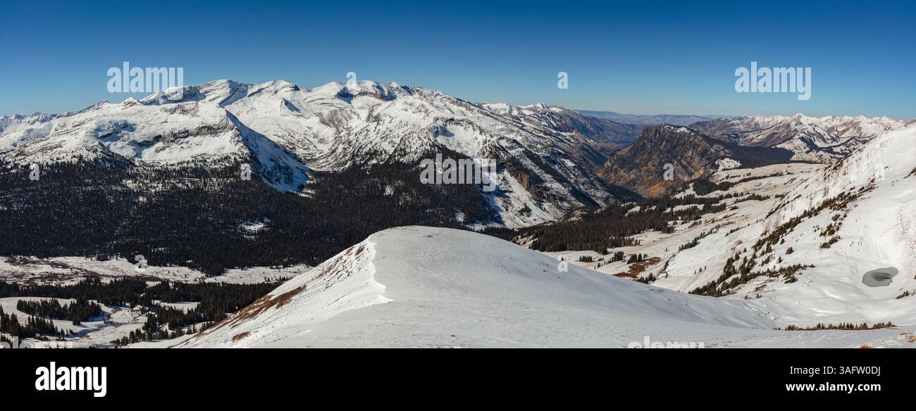 Snow covered Treasury and Treasure Mountains rise above Schofield Park ...
