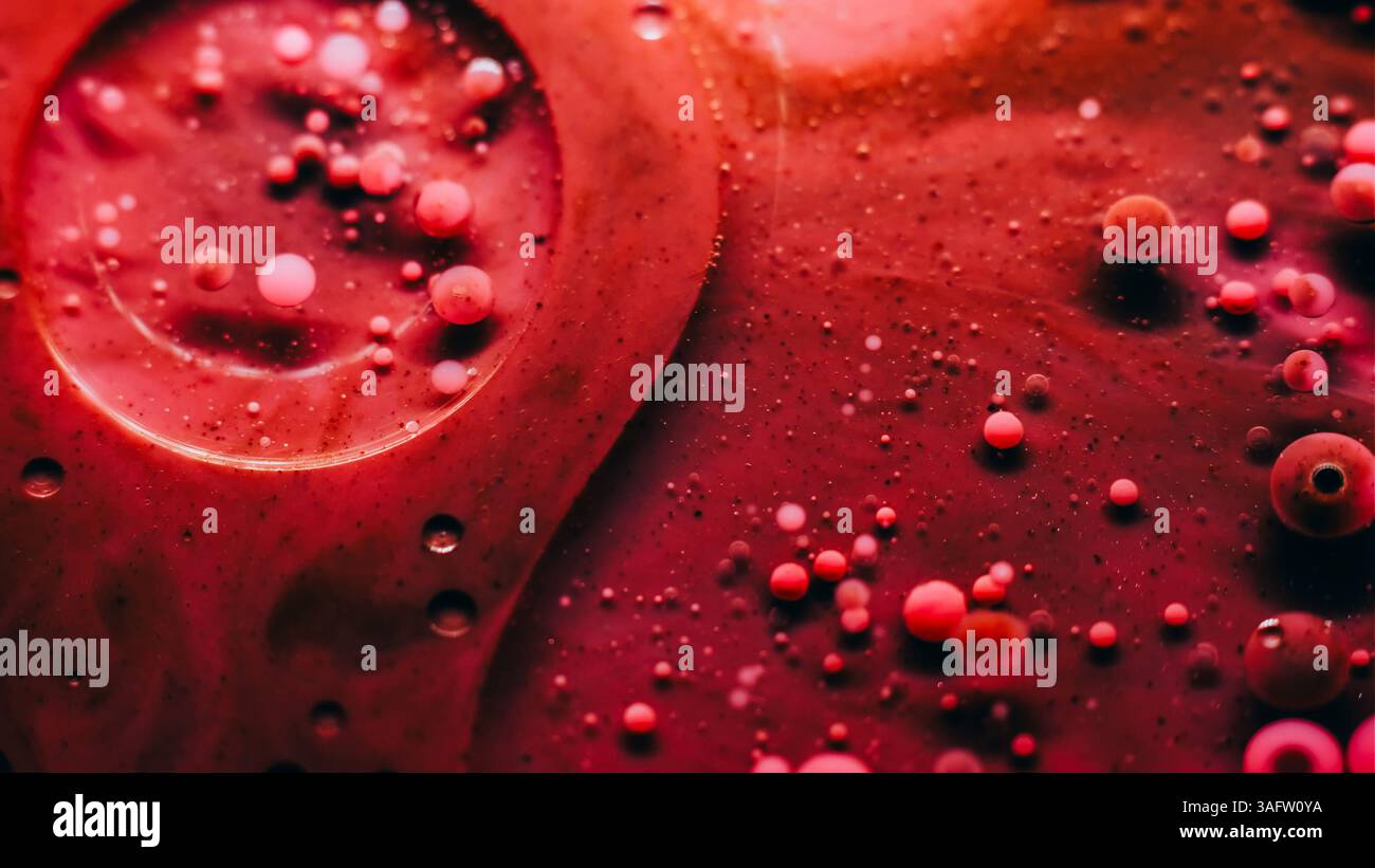 Oil art. Paint mix. Defocused red pink crimson color ink water bubbles ...