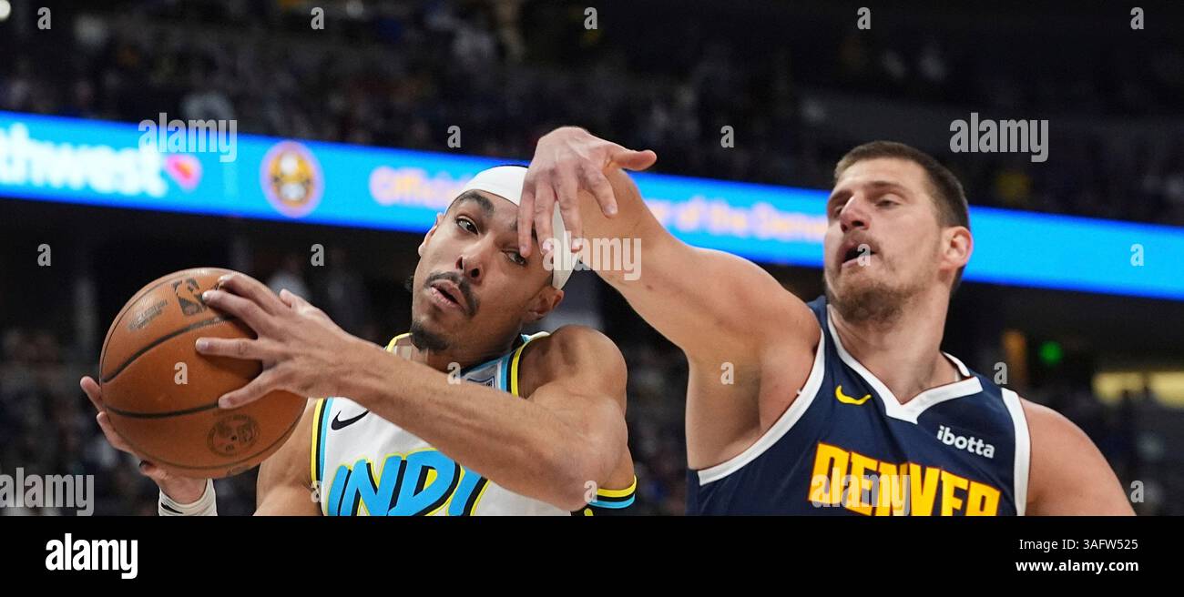 Indiana Pacers guard Andrew Nembhard (2) and Denver Nuggets center ...