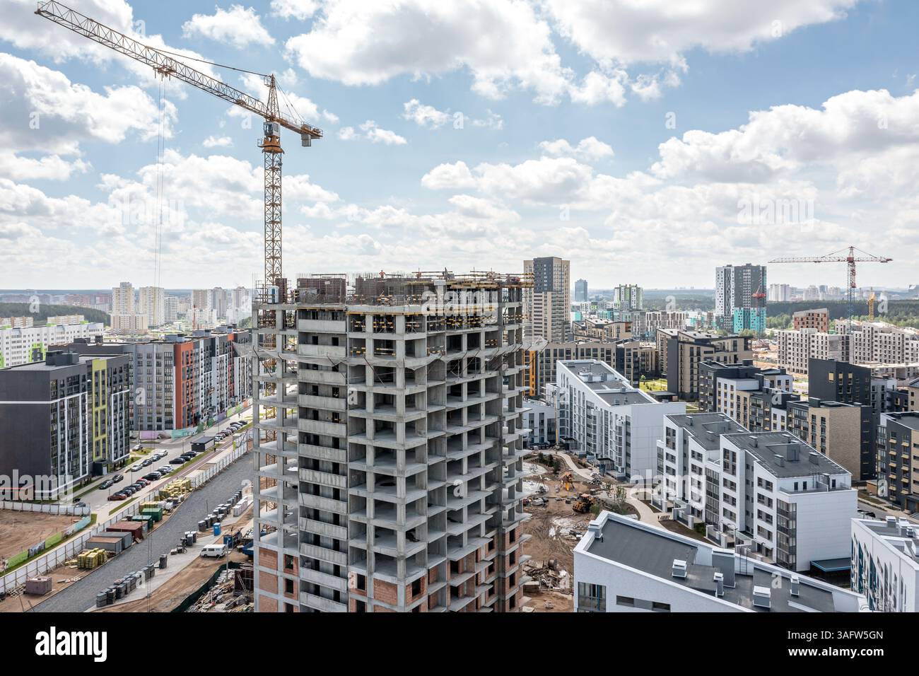 construction of new high-rise apartment building in urban residential ...