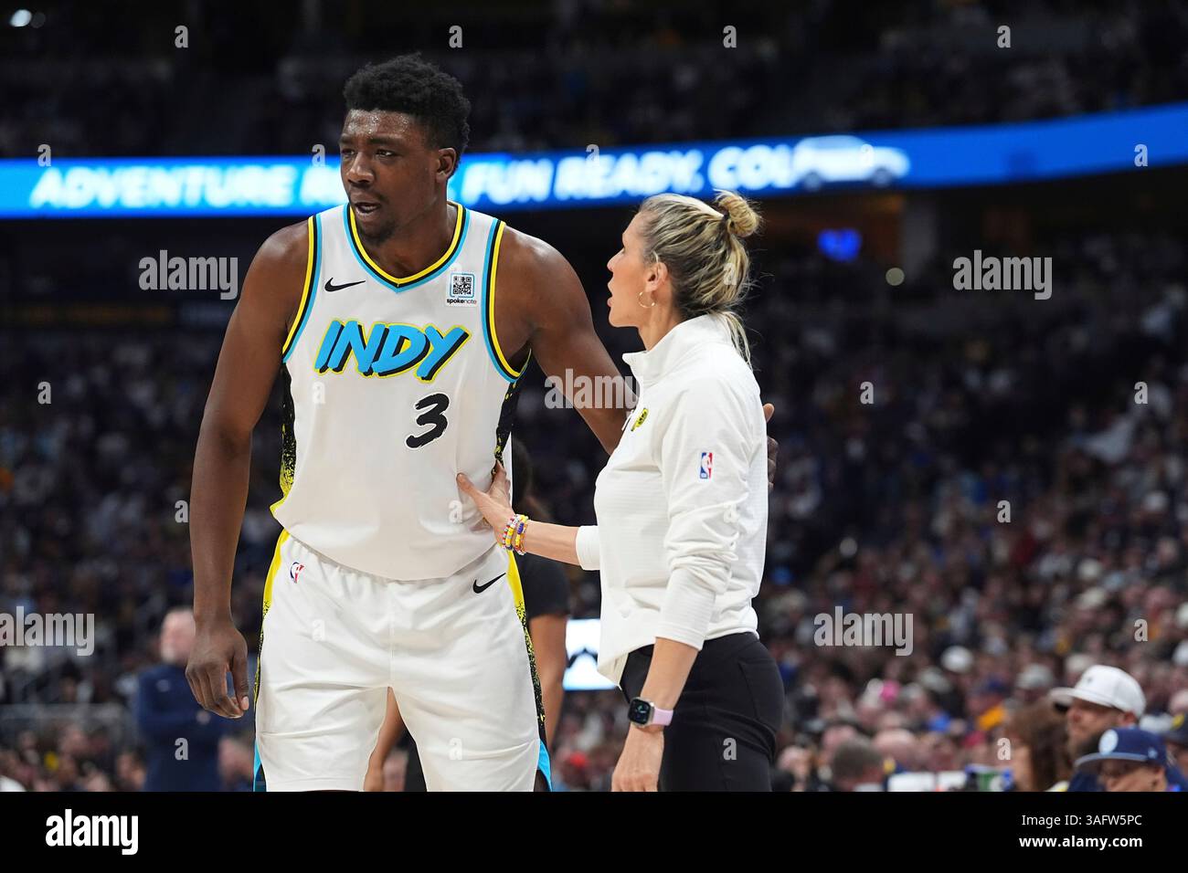 Indiana Pacers assistant coach Jenny Boucek confers with center Thomas ...