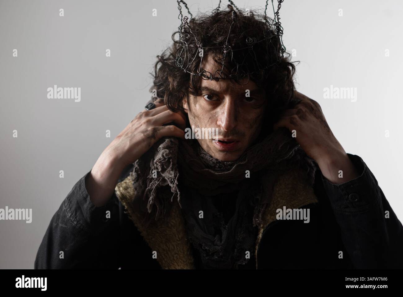 Hamlet in modern grunge or post-apocalyptic reinterpretation, young man ...