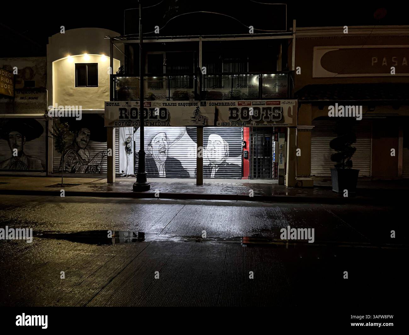 Jimenez are seen at the murals of historical figures on the steel ...