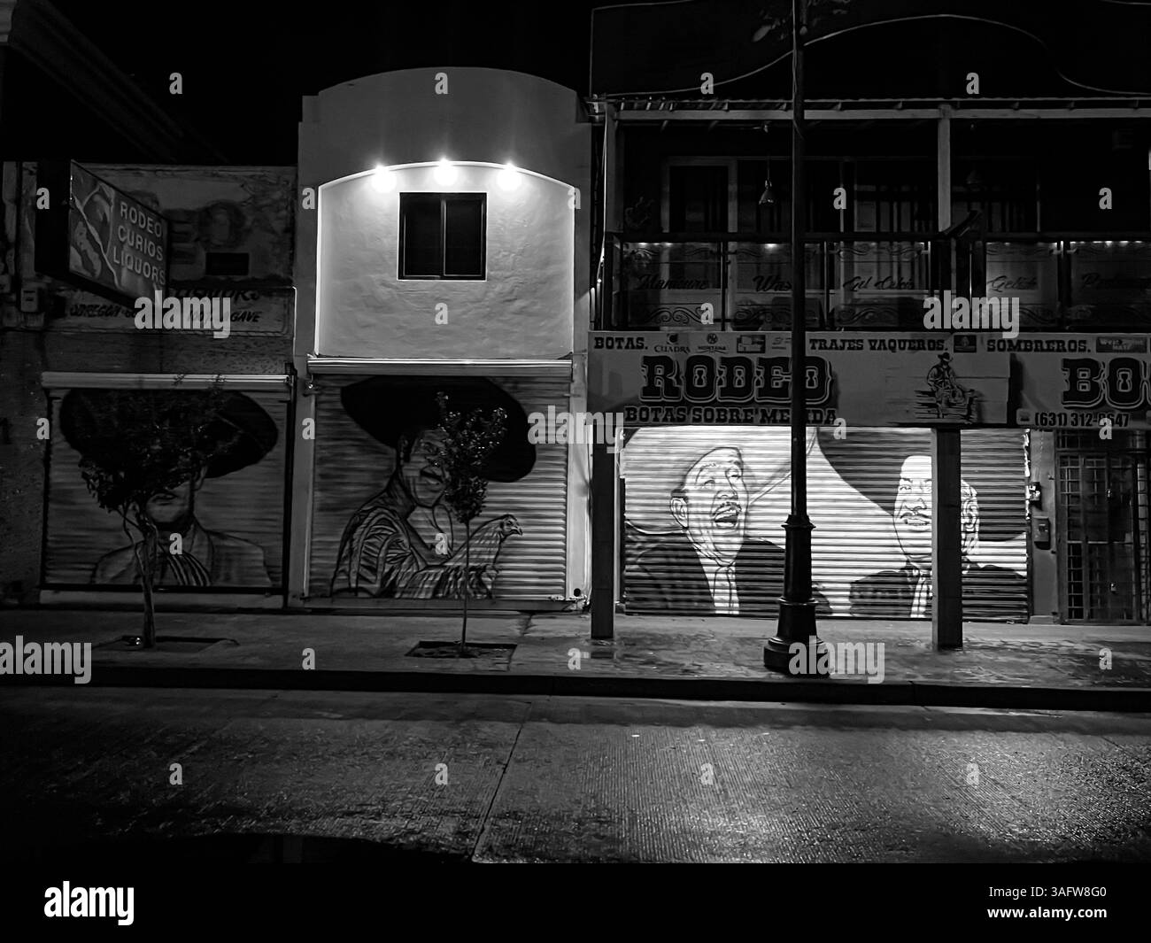 Jimenez are seen at the murals of historical figures on the steel ...