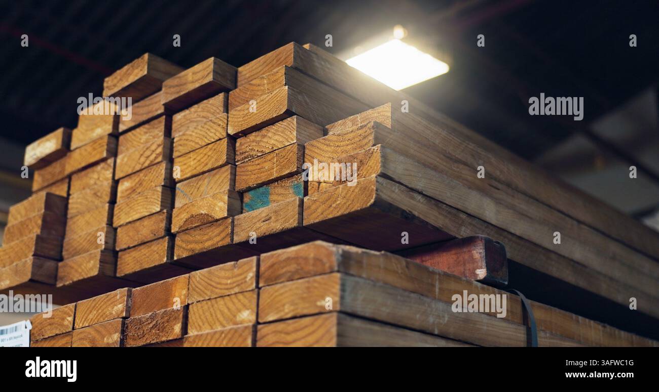 Stack, wood and storage in empty workshop for furniture manufacturing, renovation and labor ...