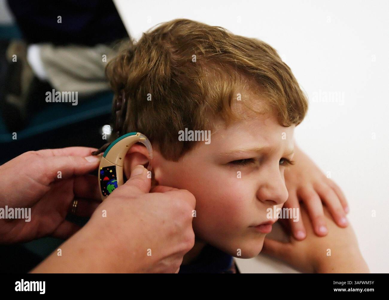 Wesley Chapel (03/01/2007) #2..Ricky Thorf, 5, has one of his two cochlear implants adjusted ...