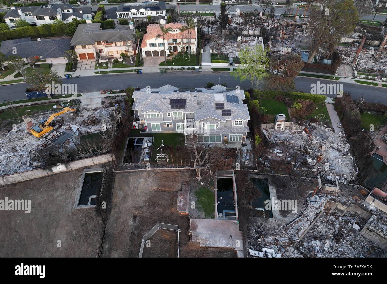 An aerial view of burned homes from the Palisades Fire, Monday, April 7 ...
