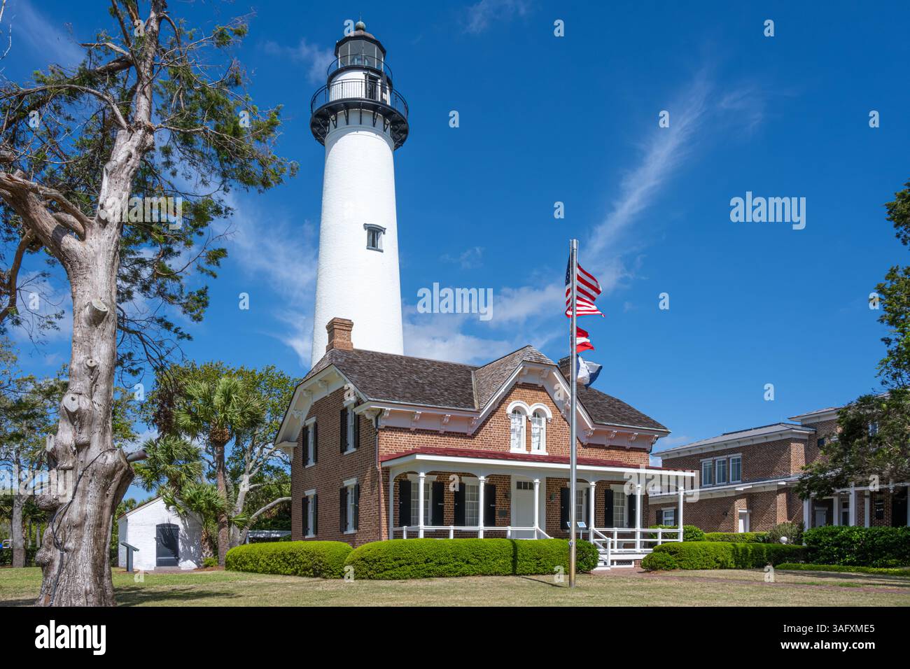 St. Simons Island Lighthouse & Museum with US, Georgia, and Coast Guard ...